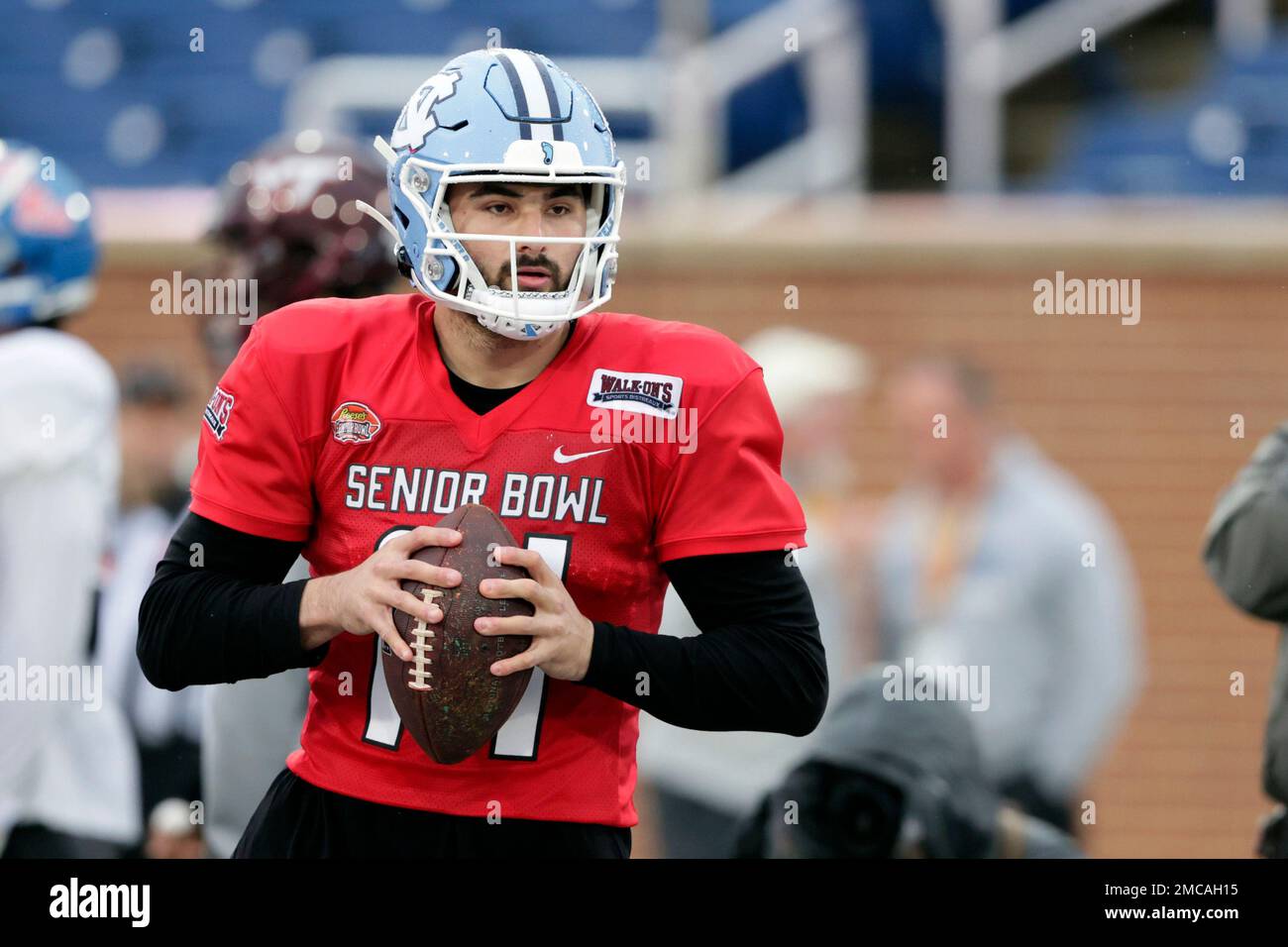 American Team quarterback Sam Howell of North Carolina runs through ...