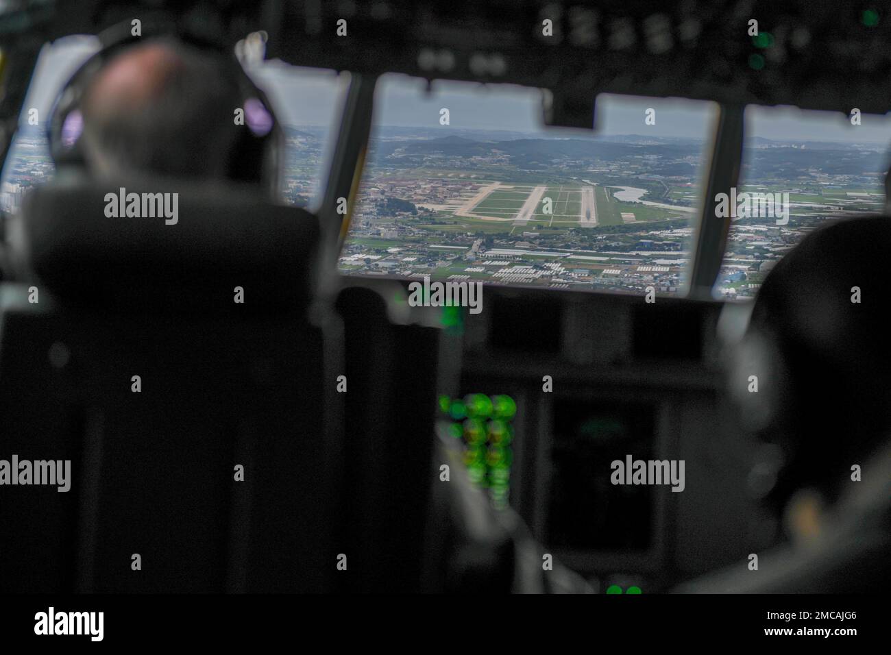 Lt. Gen. Ricky Rupp, 5th Air Force commander, descends a C-130J Super ...