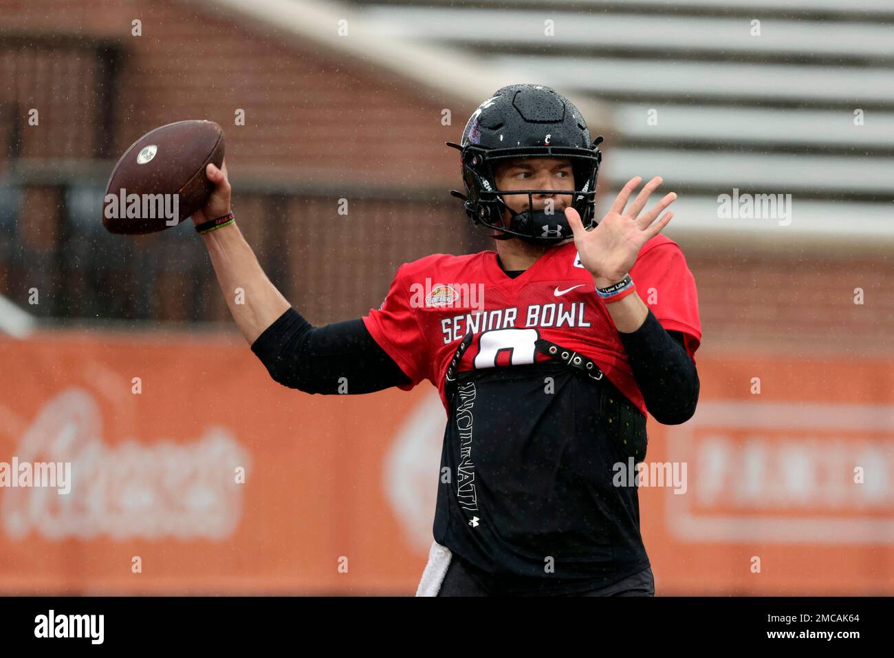 National Team quarterback Desmond Ridder of Cincinnati runs through ...