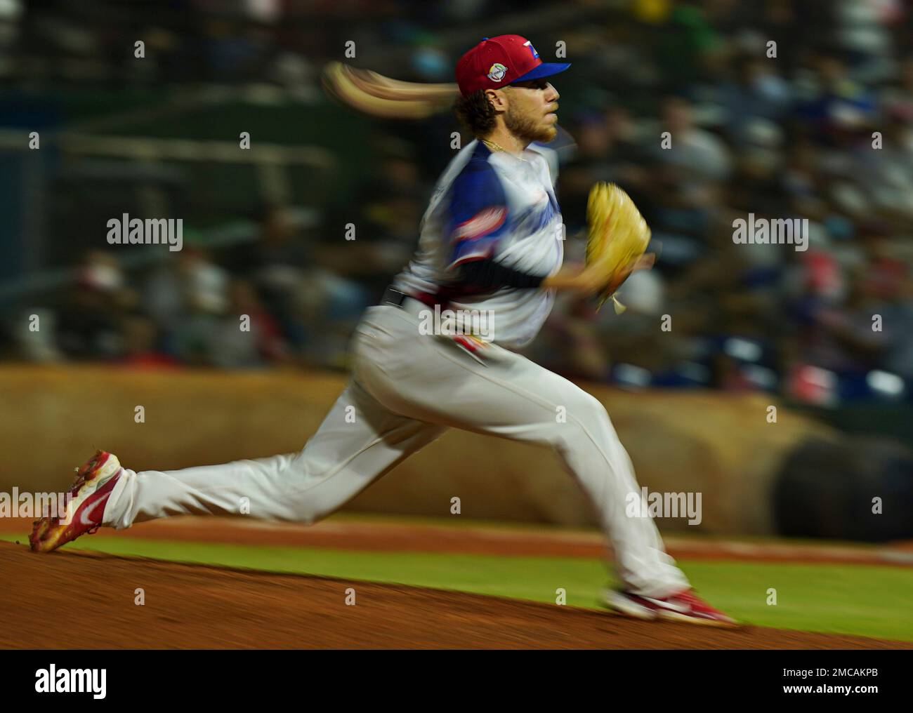 Dominican Republic's starting pitcher Tyler Alexander delivers a pitch ...