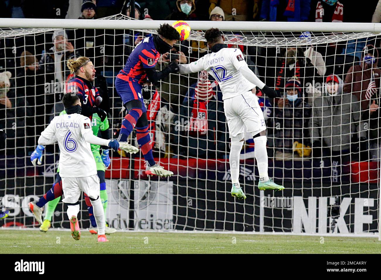 United States' Weston McKennie (8) heads in a goal past Honduras ...