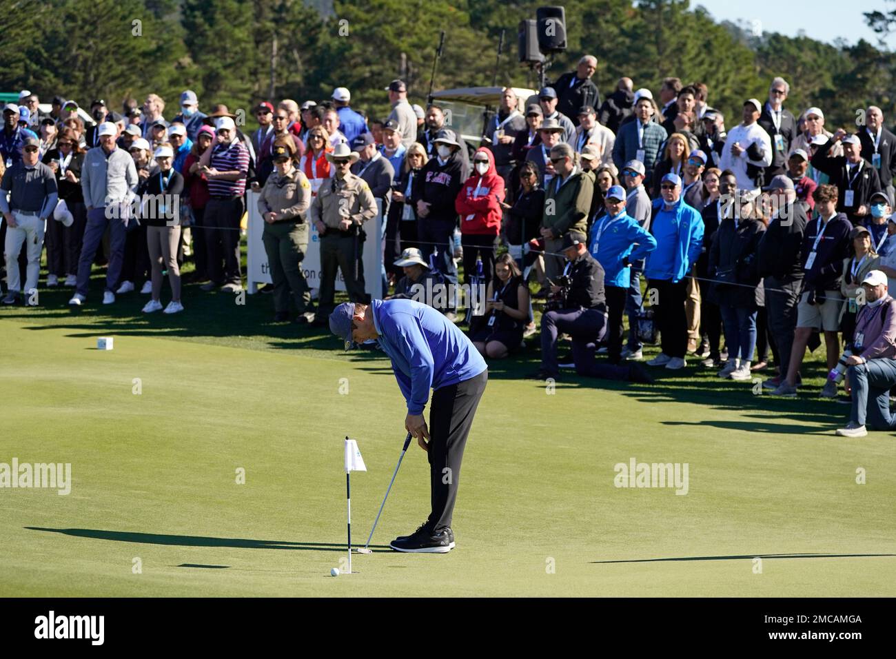 Steve Young reacts after a missed putt during the charity putting event ...