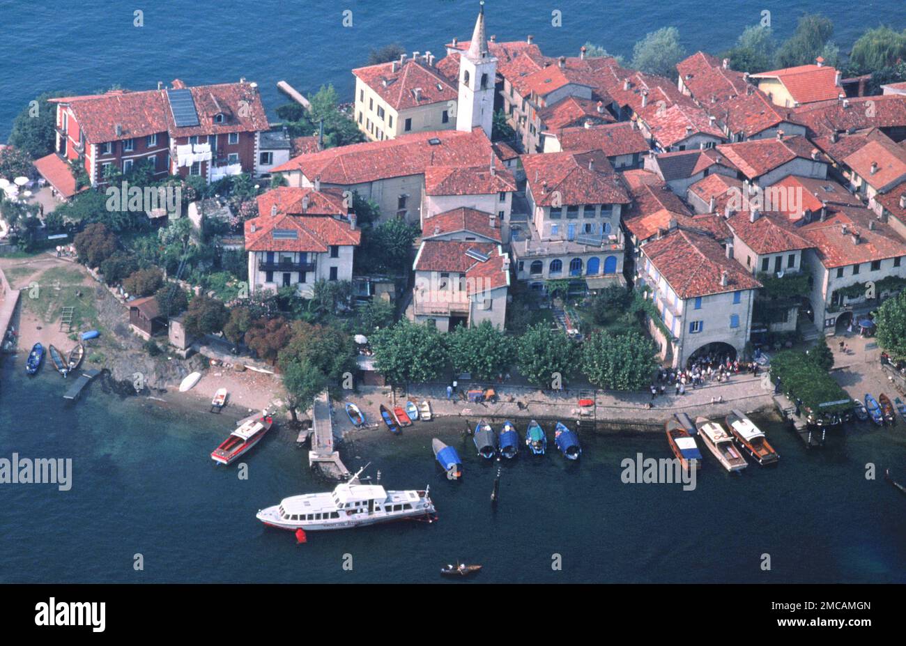Isola dei Pescatori, a picturesque haven nestled beside the shimmering ...