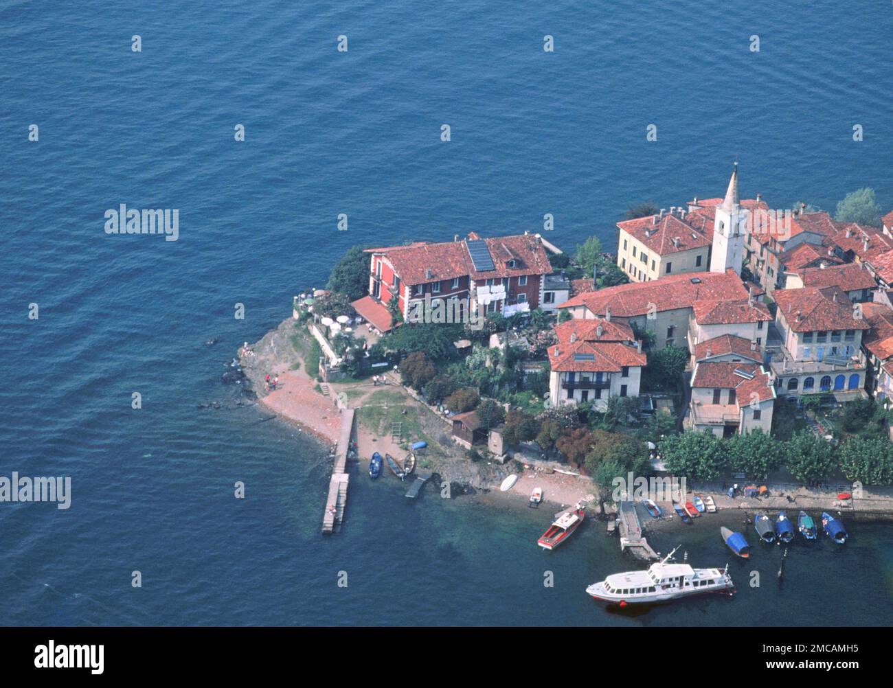Isola dei Pescatori, a picturesque haven nestled beside the shimmering ...