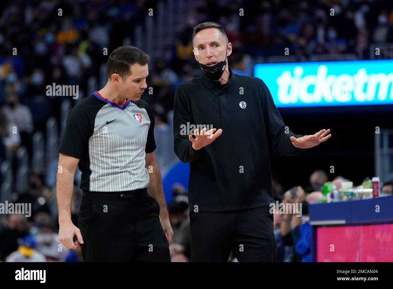 Brooklyn Nets head coach Steve Nash, right, talks with referee Brian ...