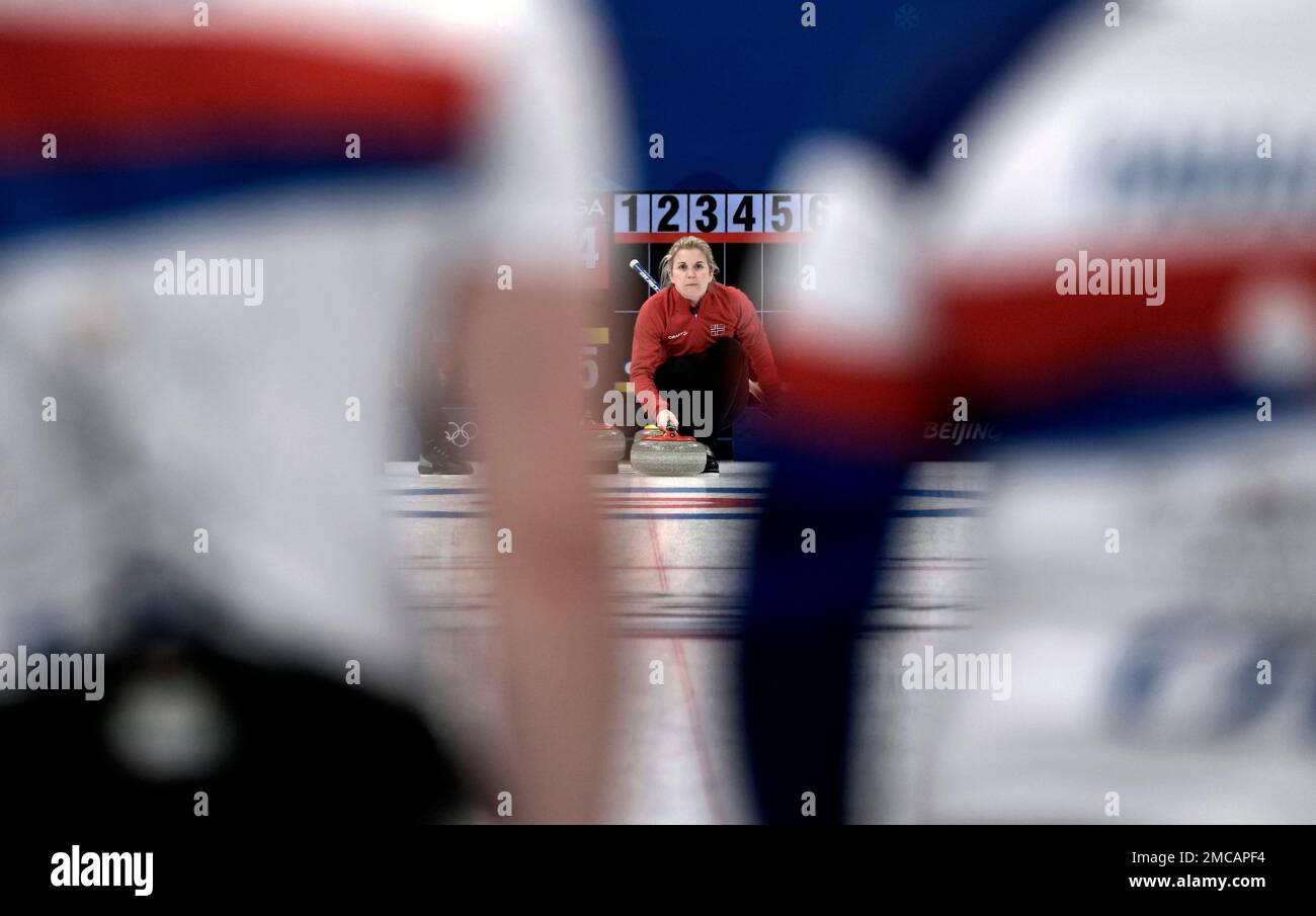Norway's Kristin Skaslien throws a stone during their mixed doubles ...
