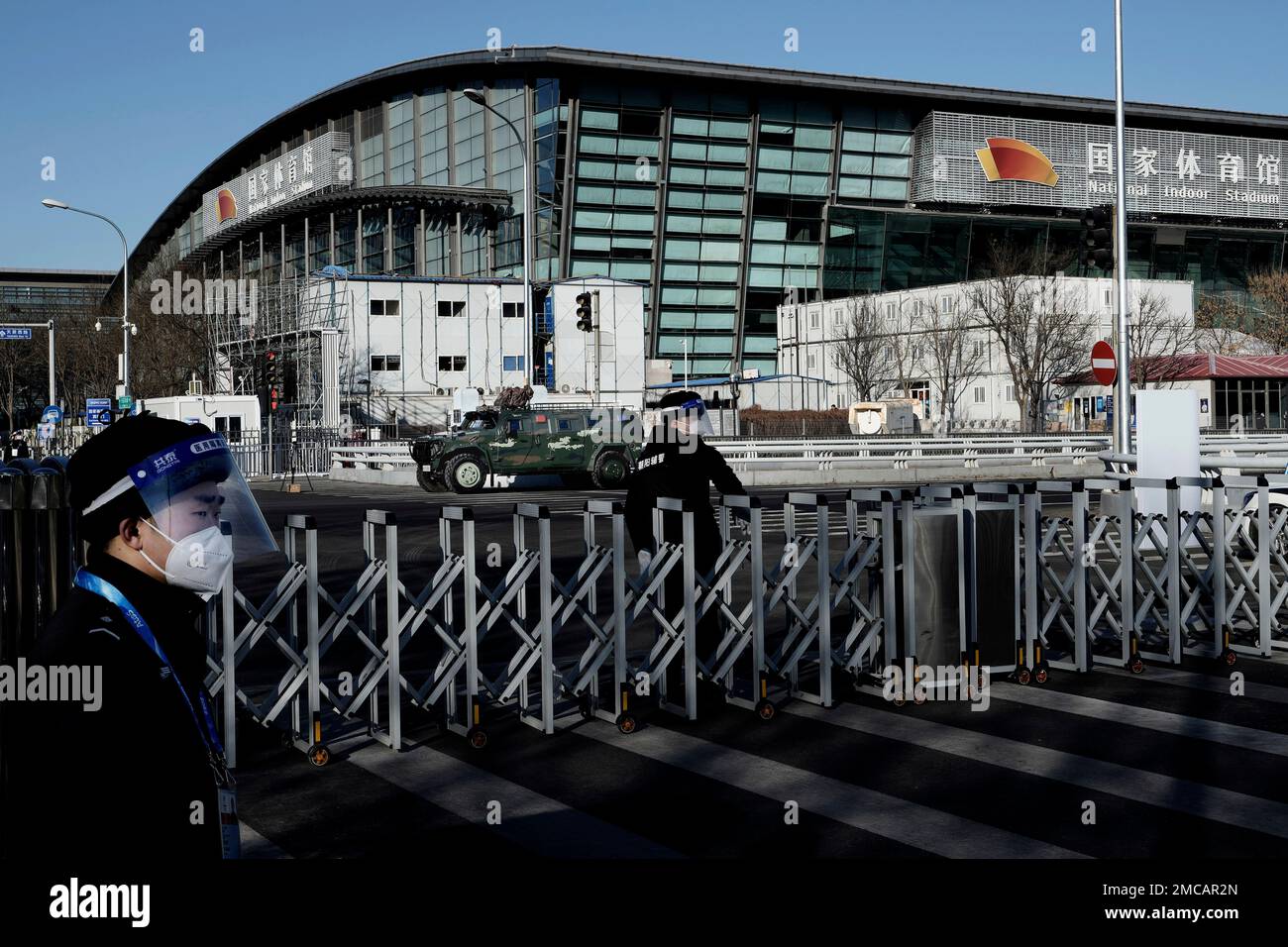 Chinese security stand guard outside the National Indoor Stadium ahead ...