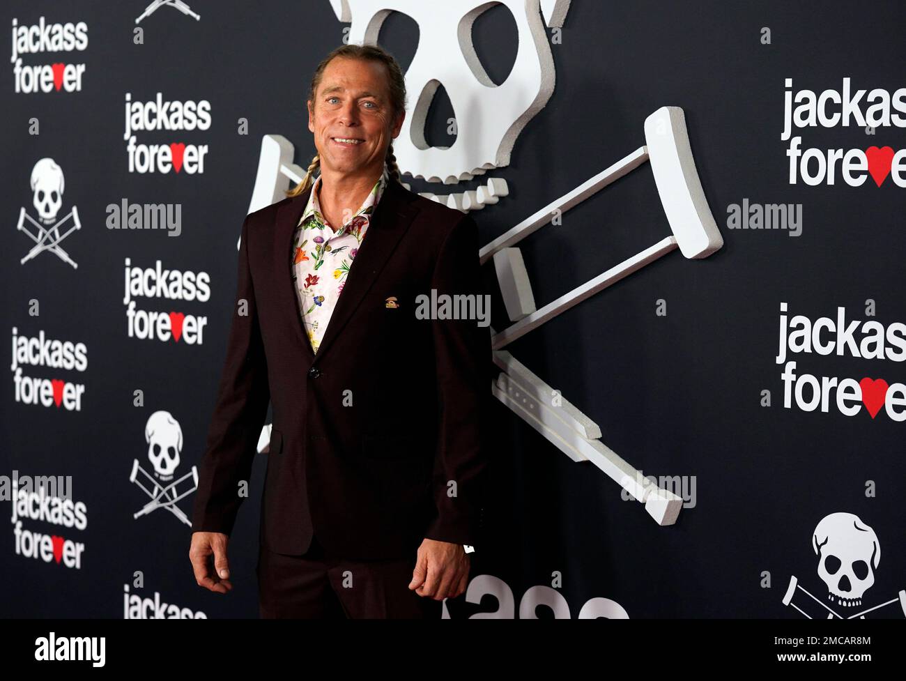 Dave England poses at the premiere of the film "Jackass Forever ...