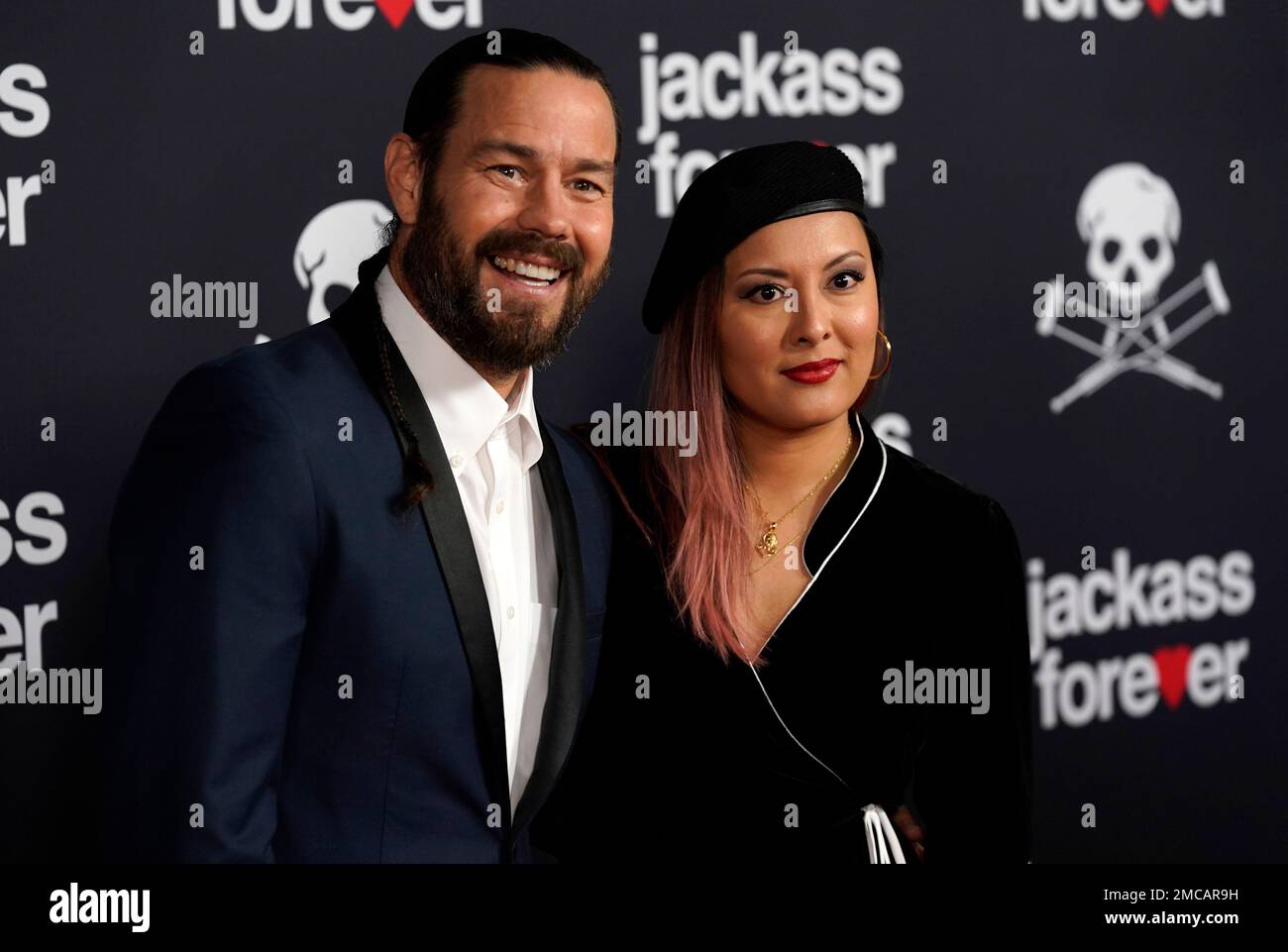 Chris Pontius and his wife Mae pose together at the premiere of the ...