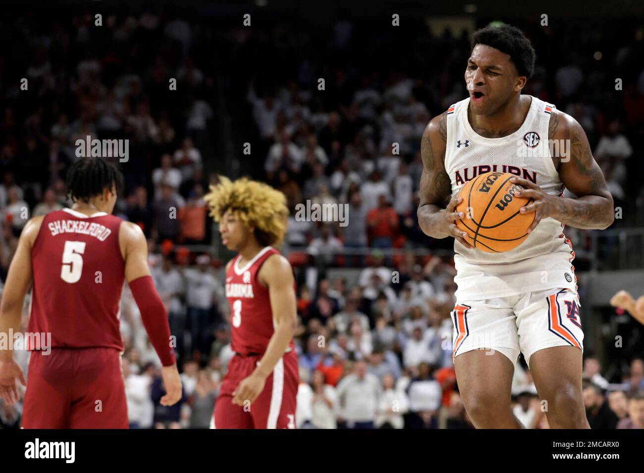 Auburn guard K.D. Johnson (0) reacts after a foul during the second ...