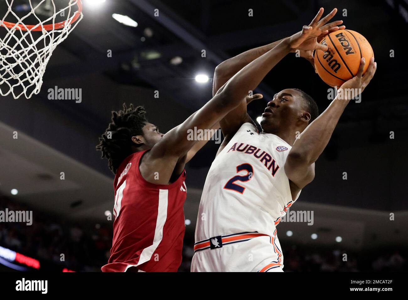 Auburn forward Jaylin Williams (2) shoots as Alabama center Charles Bediako (10) defends during ...