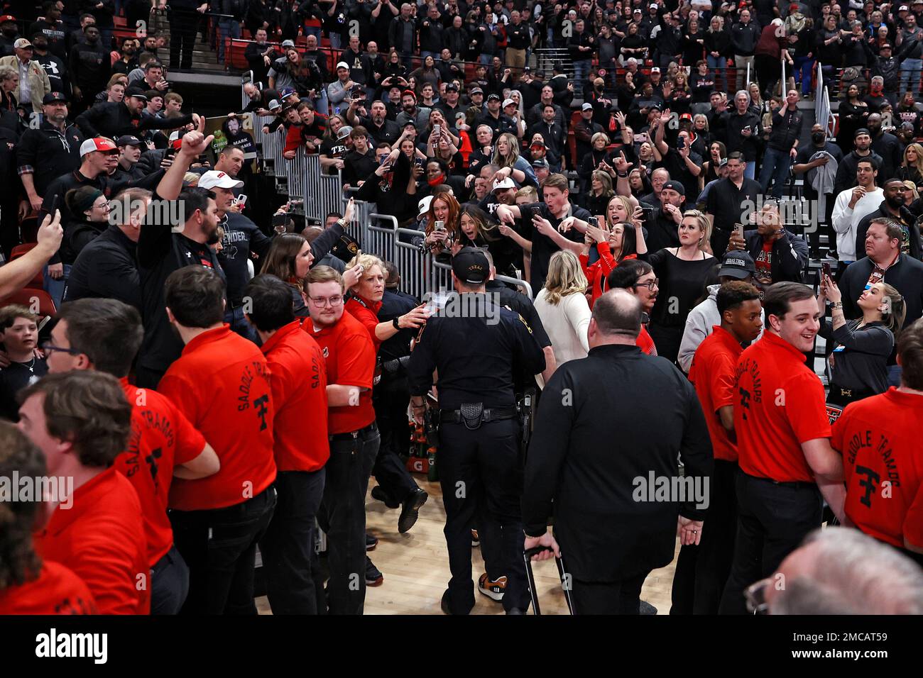 Texas Tech fans yell at Texas coach Chris Beard as he walks off the ...