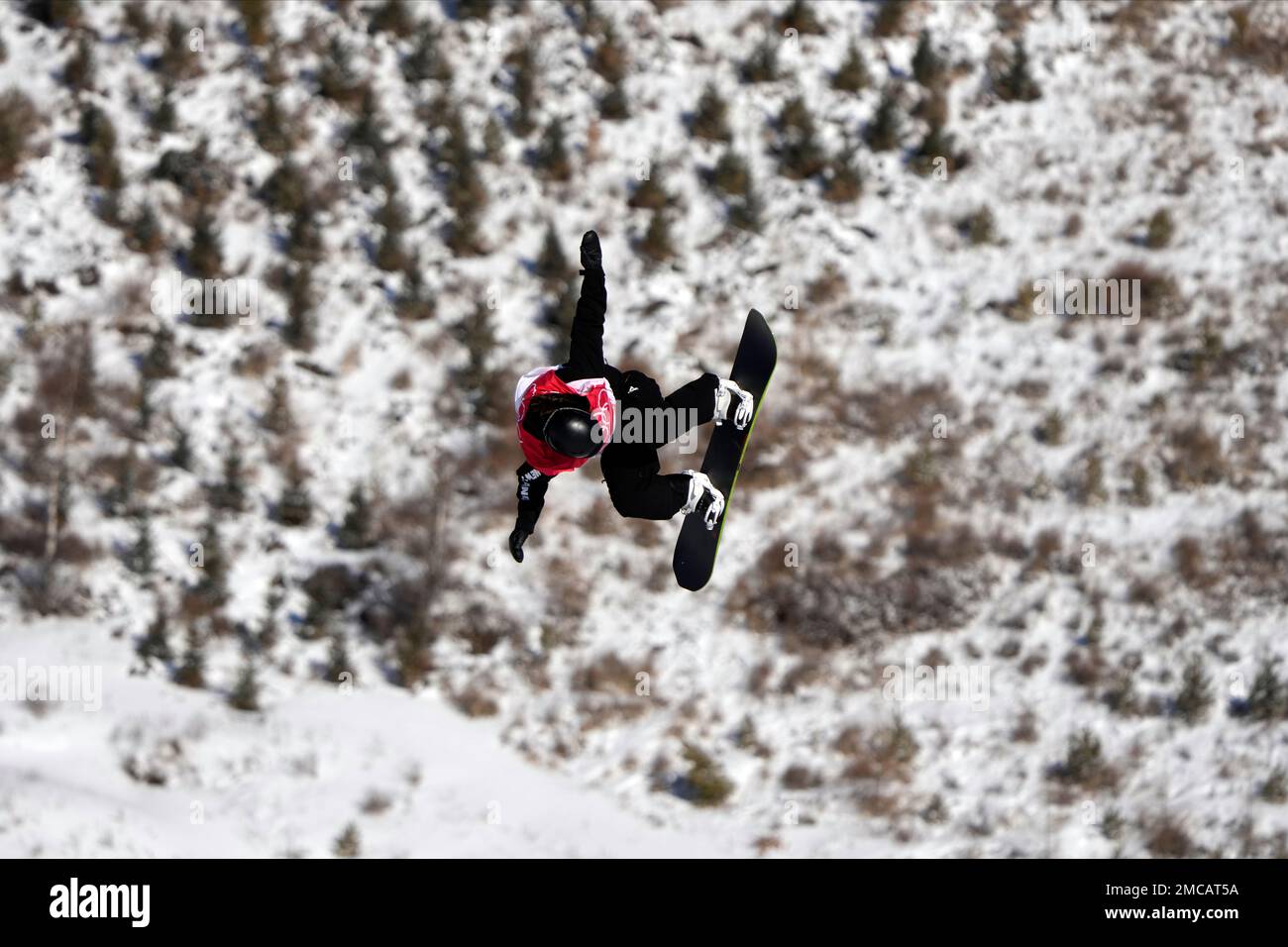 New Zealand's Cool Wakushima catches air on the slopestyle course ahead ...
