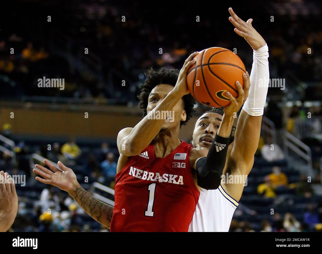 Nebraska guard Alonzo Verge Jr. (1) is guarded from behind by Michigan ...