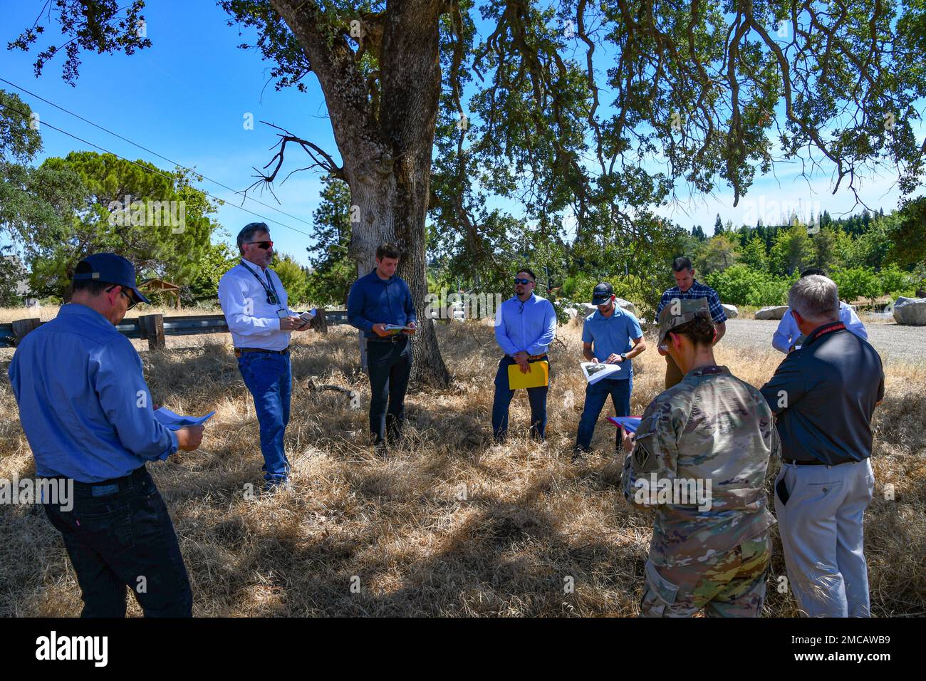 Gerry Slattery, second from left, program manager of the Folsom Dam ...