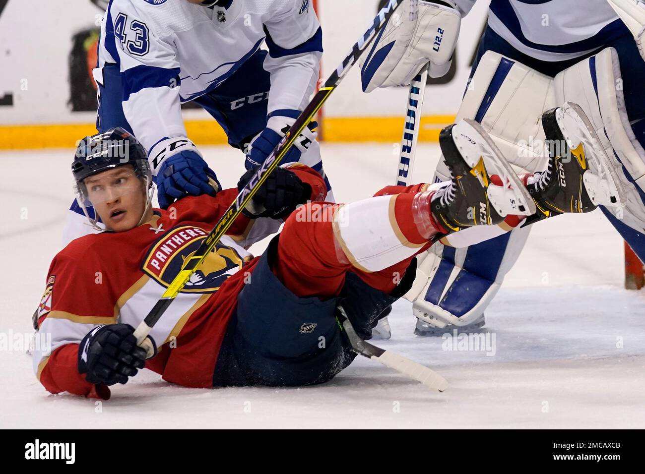 Florida Panthers center Anton Lundell falls to the ice during the ...