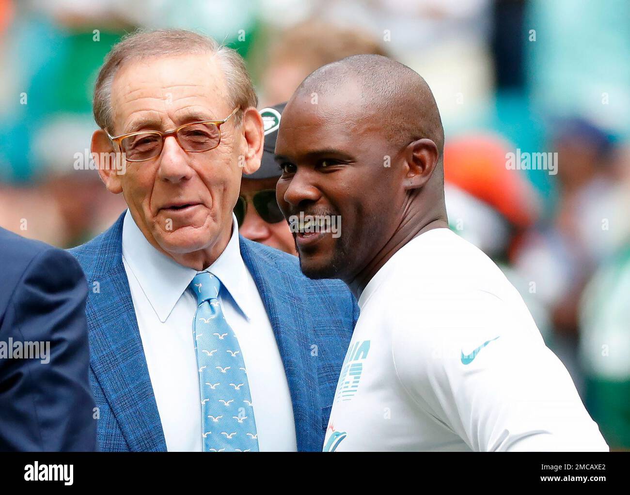 FILE -Miami Dolphins head coach Brian Flores talks to Miami Dolphins ...