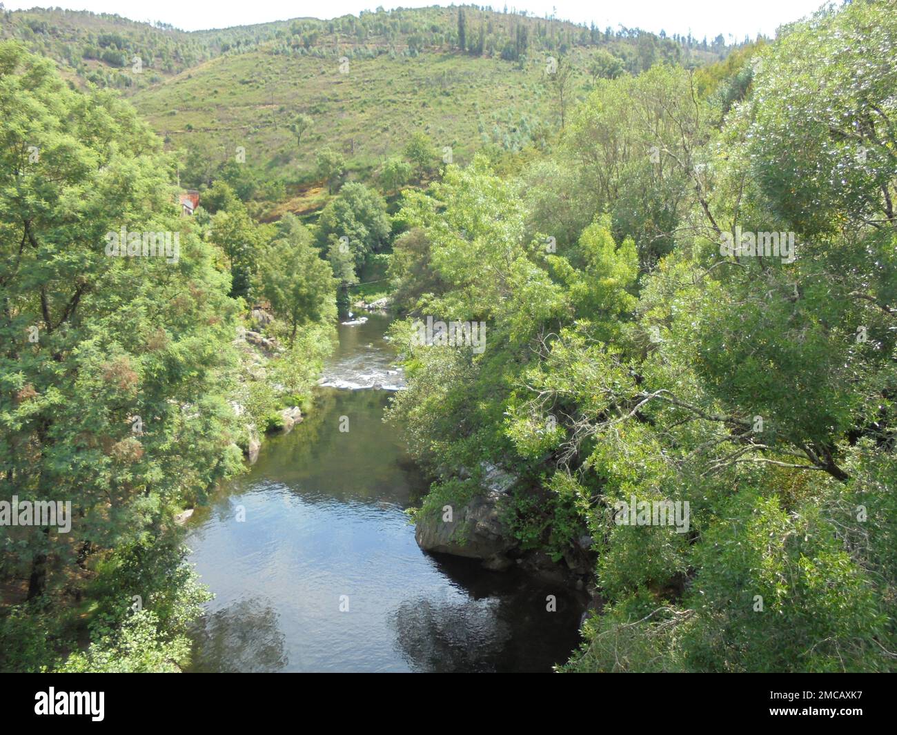 A small river in a village Stock Photo - Alamy