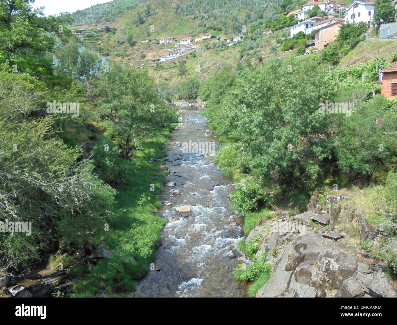 A small river in a village Stock Photo - Alamy