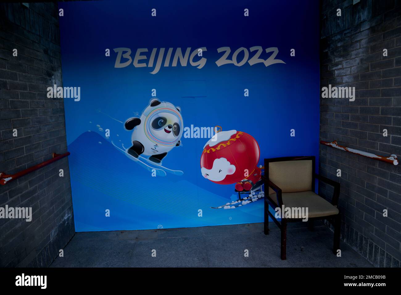 A sign with the image of Paralympic mascot Shuey Rhon Rhon, right, and Winter Olympic mascot ...