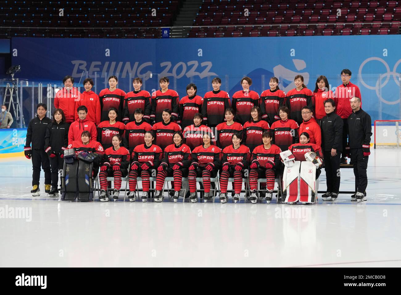 Members of Japan's women's hockey team pose for a team picture at the ...