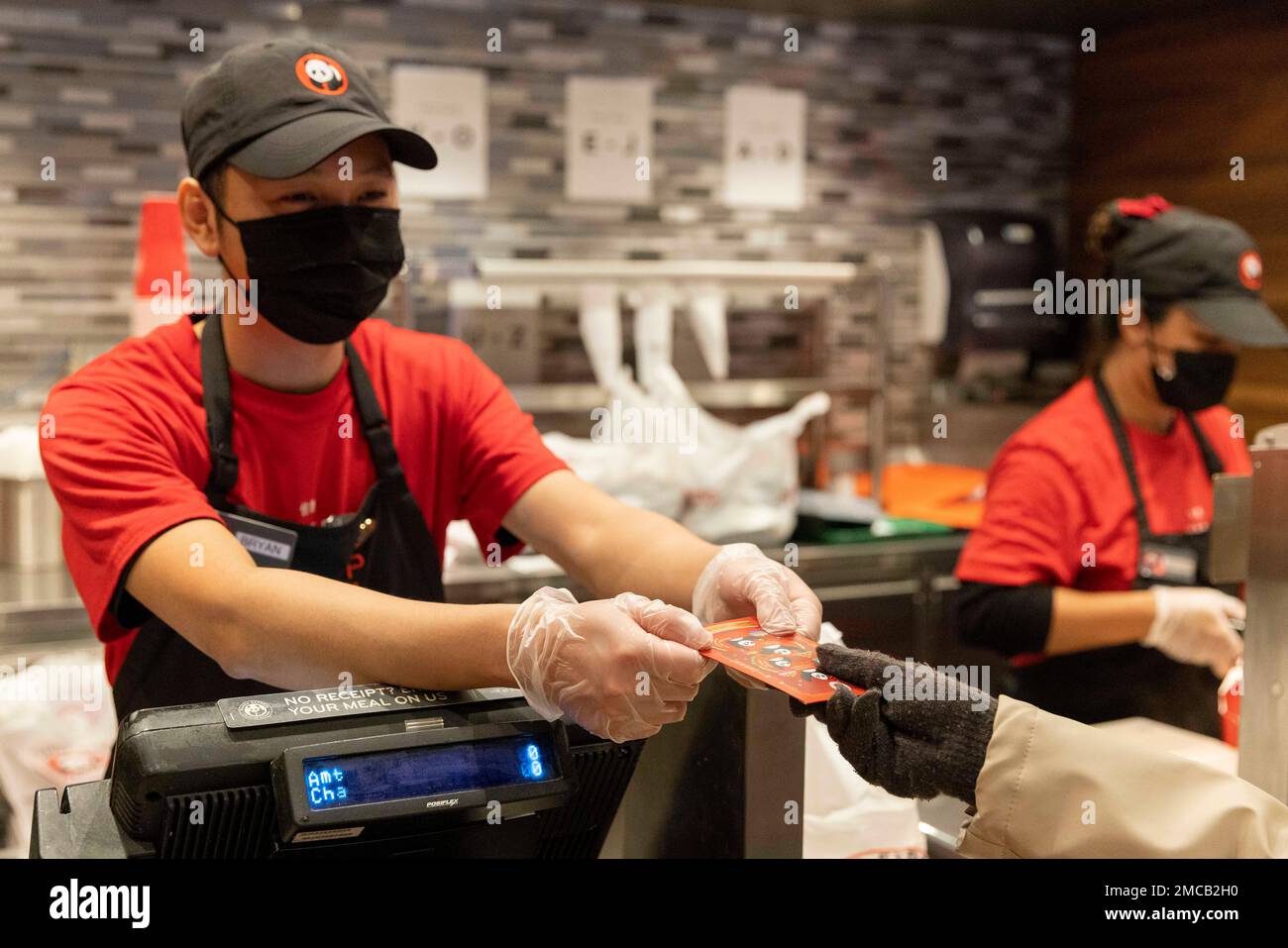 IMAGE DISTRIBUTED FOR PANDA EXPRESS - Guest receives a red envelope at ...