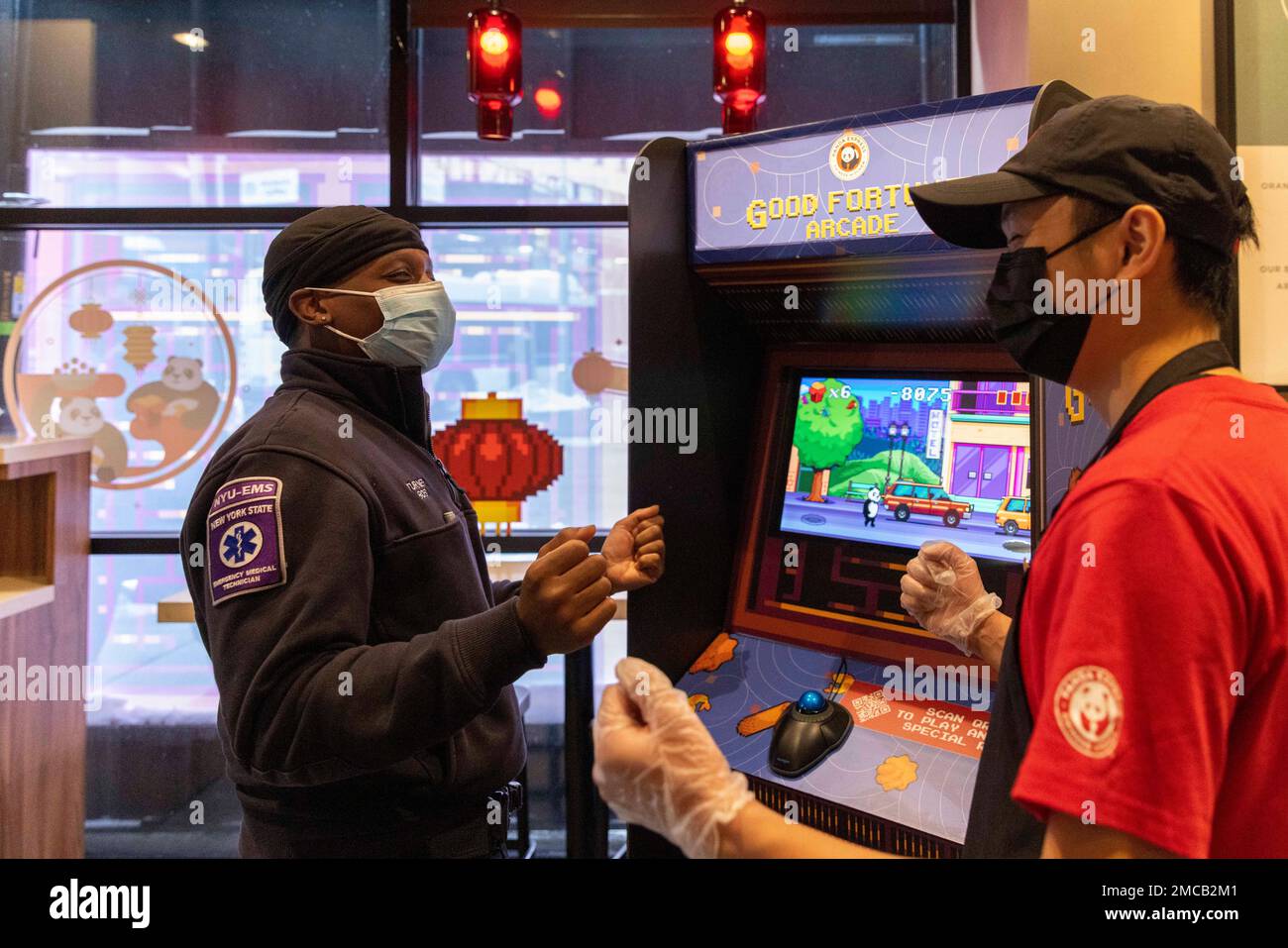 IMAGE DISTRIBUTED FOR PANDA EXPRESS - Panda Express associate assists ...