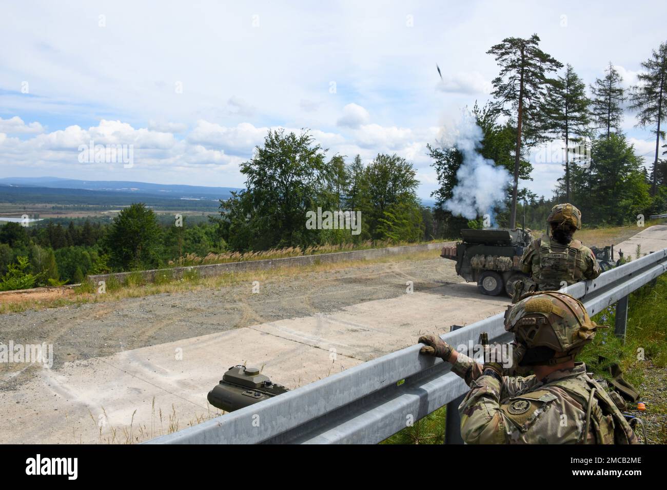 U.S. Soldiers assigned to 1st Squadron, 2nd Cavalry Regiment observe ...