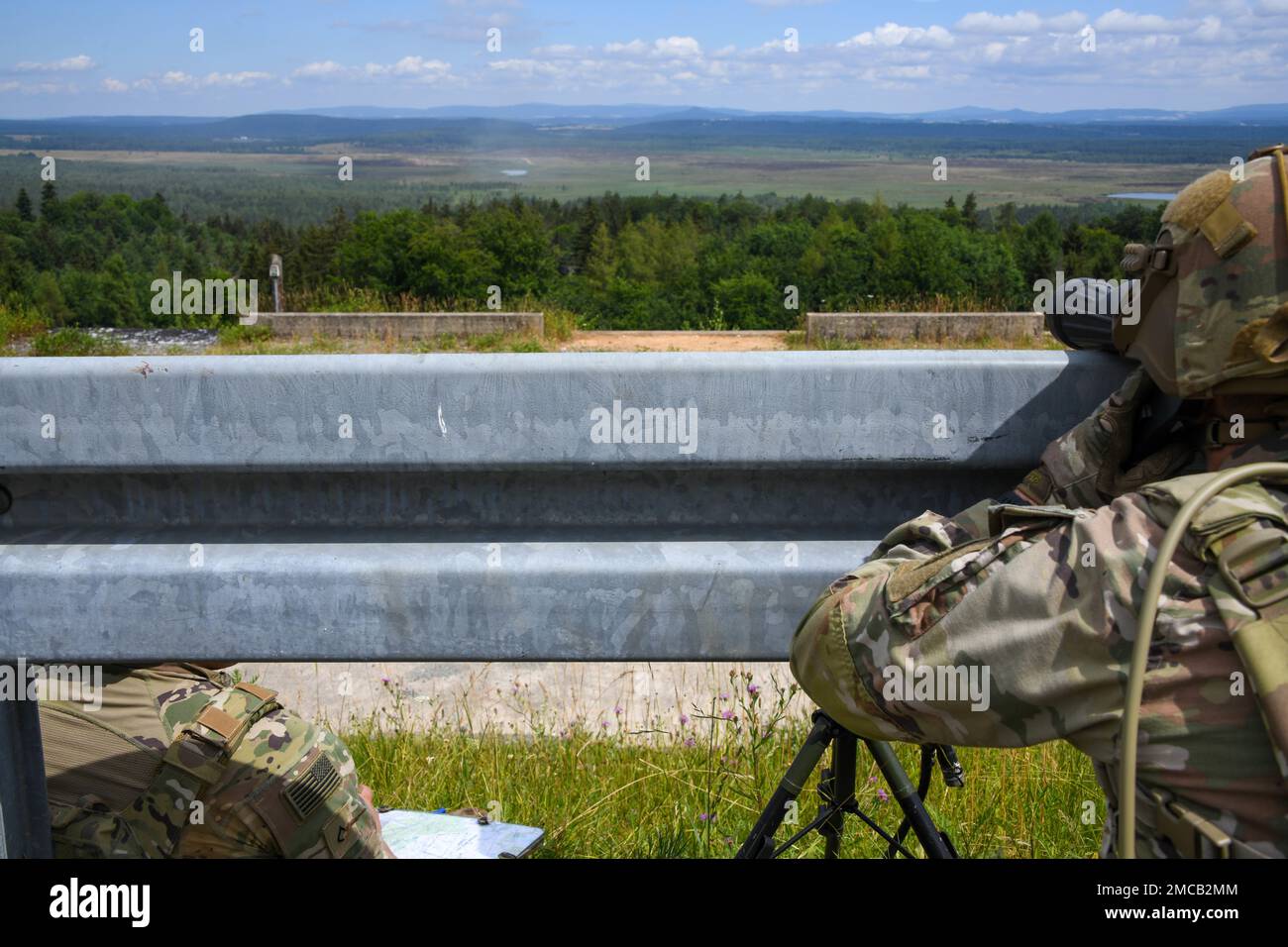 U.S. Soldiers assigned to 1st Squadron, 2nd Cavalry Regiment observe ...