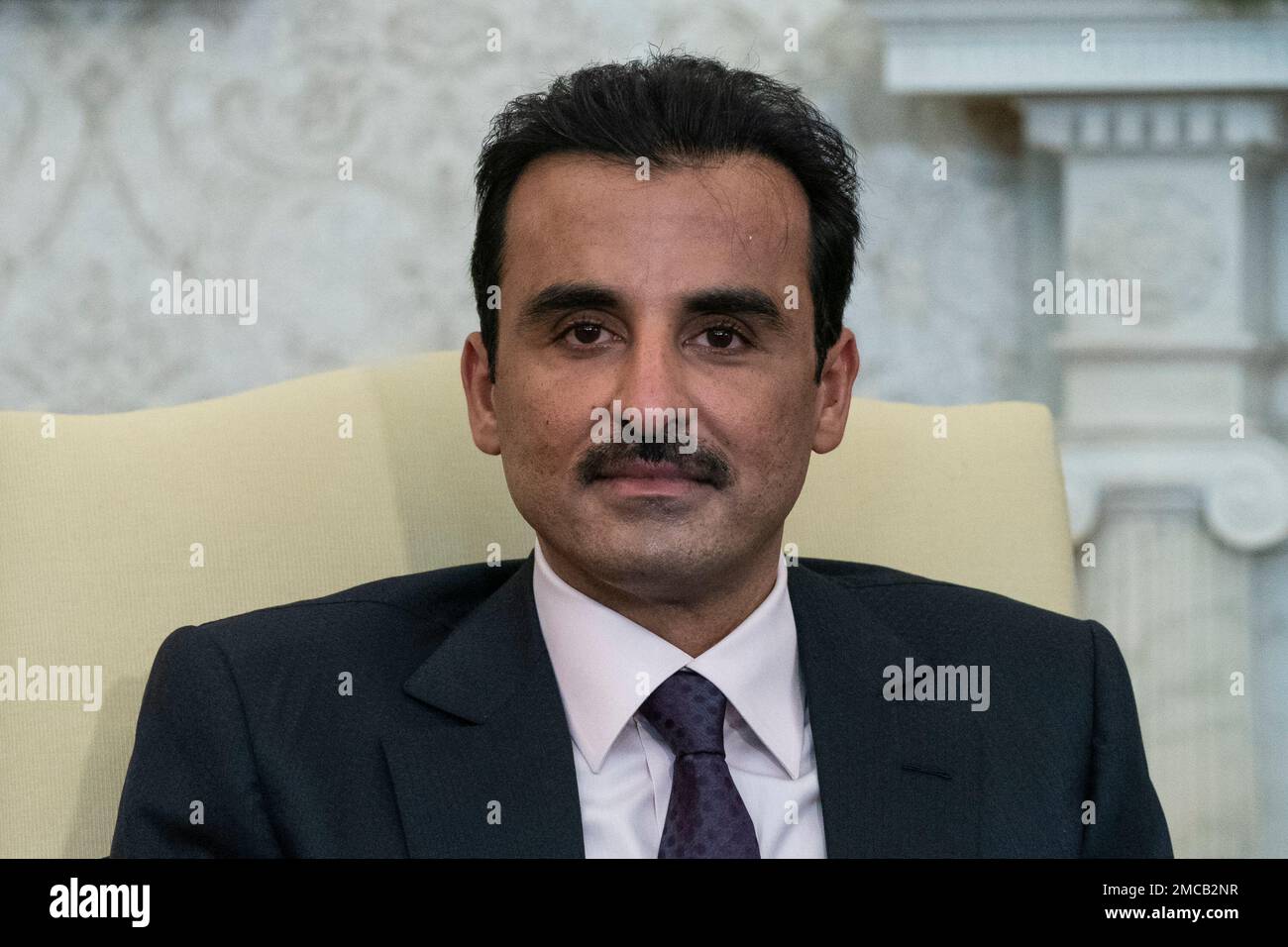 Qatar's Emir Sheikh Tamim bin Hamad Al Thani pauses while speaking ...