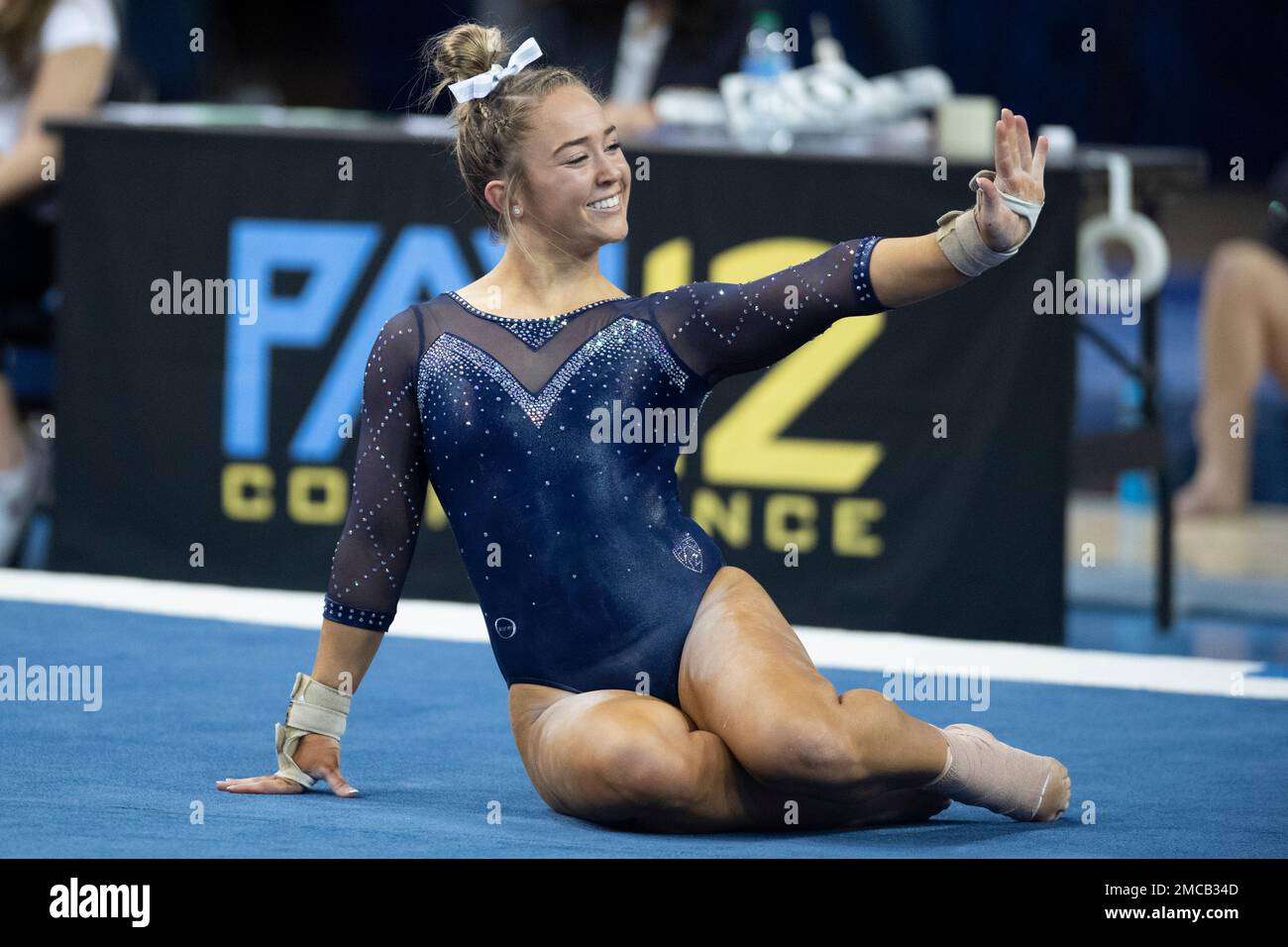 Arizona's Emily Mueller finishes her floor routine during an NCAA ...