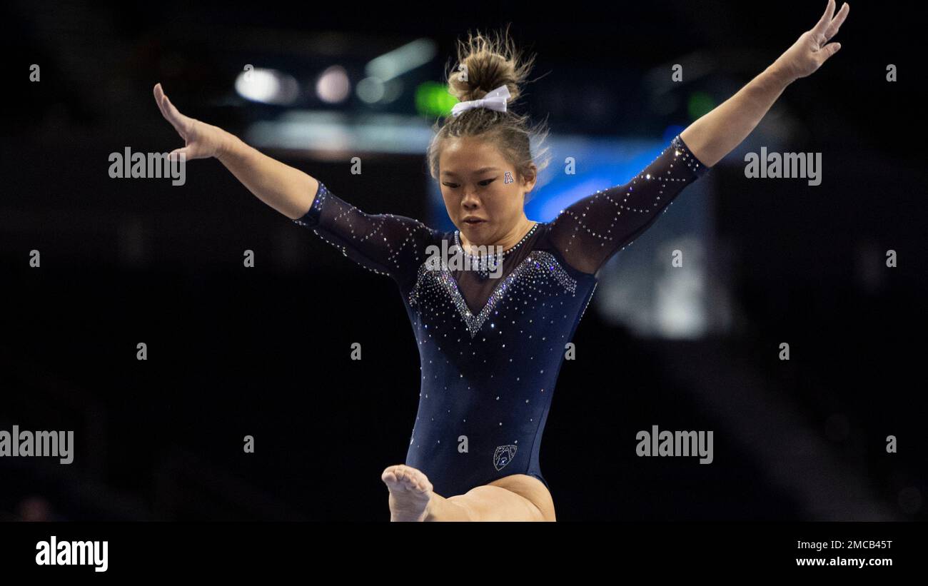 Arizona's Elena Deets on the balance beam during an NCAA gymnastics ...