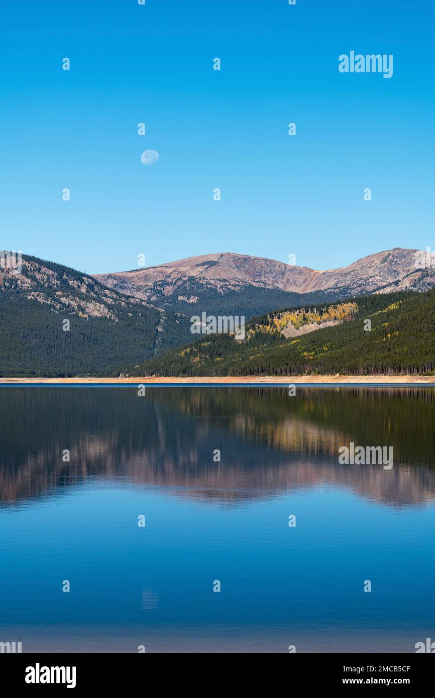 High Mountain Peaks are reflected on beautiful Turquoise Lake, which ...