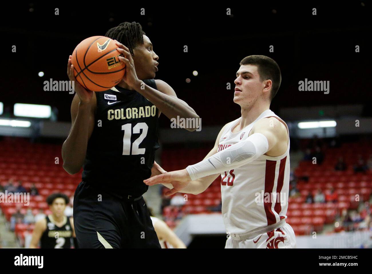 Colorado forward Jabari Walker, left, controls the ball while defended ...