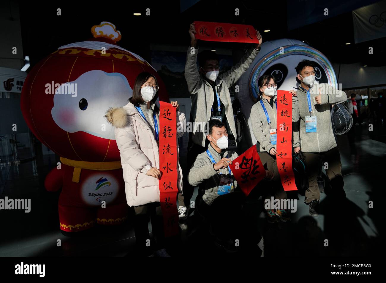 Olympic workers celebrate the Chinese New Year with Winter Olympics and ...