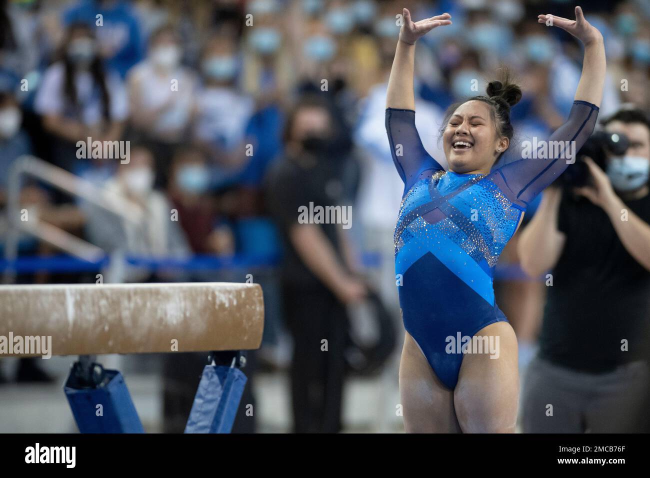 UCLA's Emma Malabuyo celebrates her performance on the balance Beam ...
