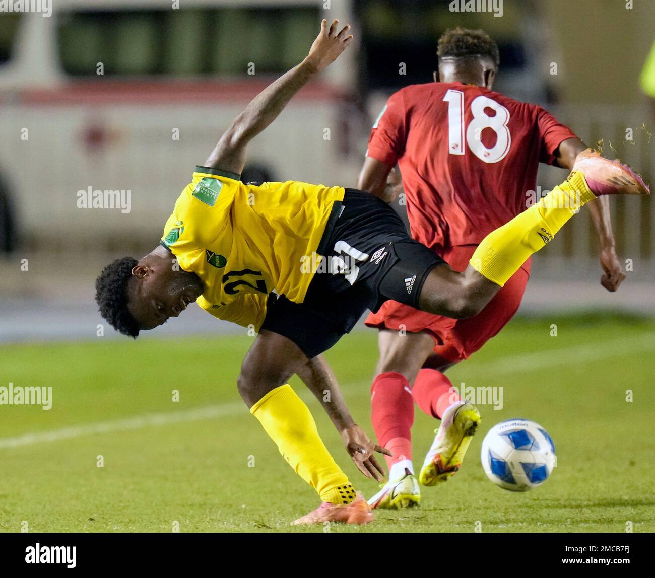 Jamaica's Javain Brown, left, is stripped of the ball by Panama's ...