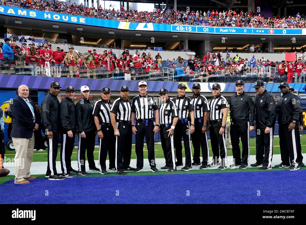 Officials pose for a picture before the NFC Championship NFL football ...