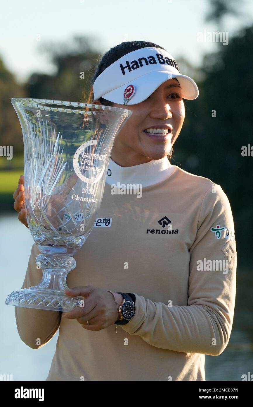 Lydia Ko of New Zealand smiles as she poses with the trophy after ...