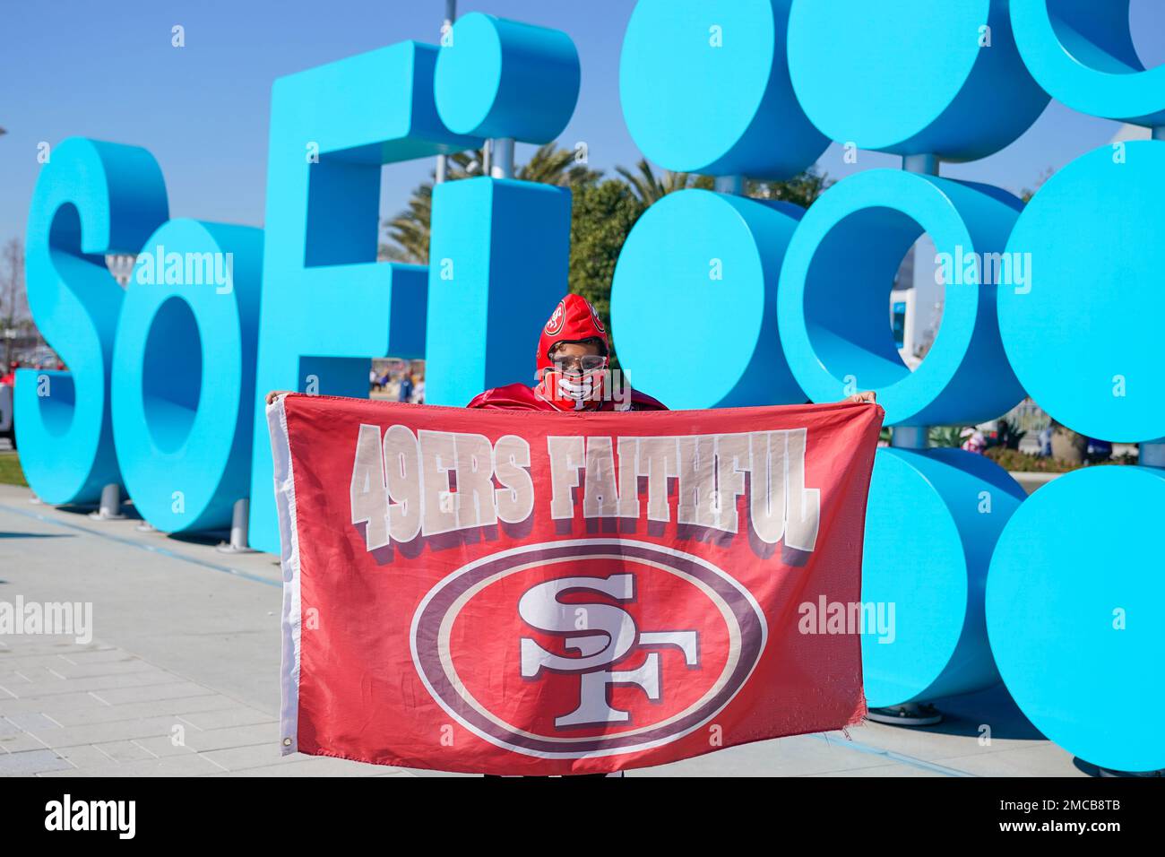 A San Francisco 49ers fan makes their way to SoFi Stadium before the ...