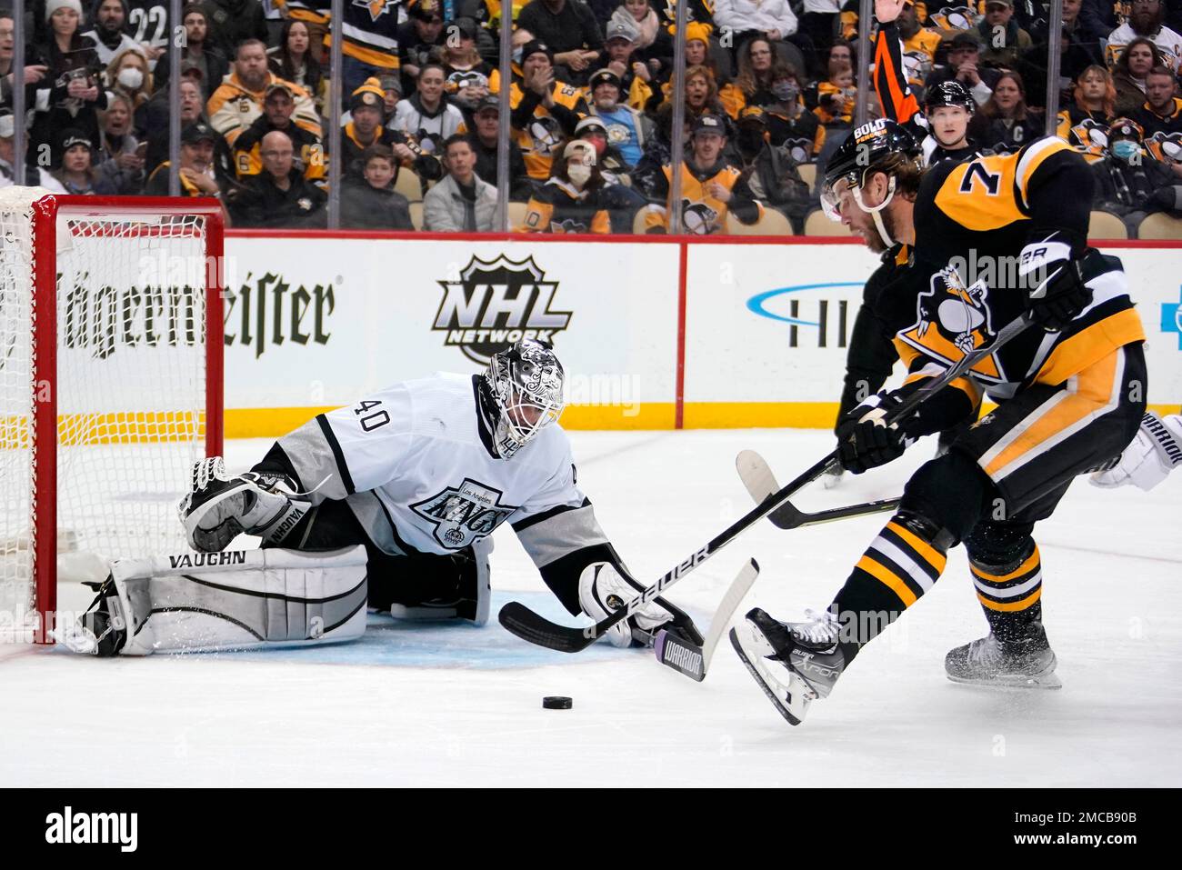 Pittsburgh Penguins' Jeff Carter (77) can't get a shot off in front of ...