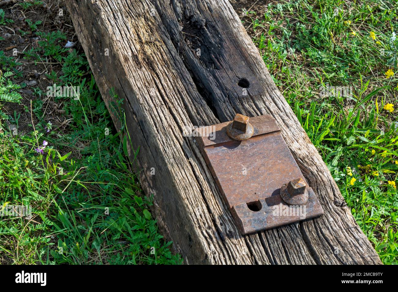 One old railway sleeper with a metal plate carrying the rail Stock ...