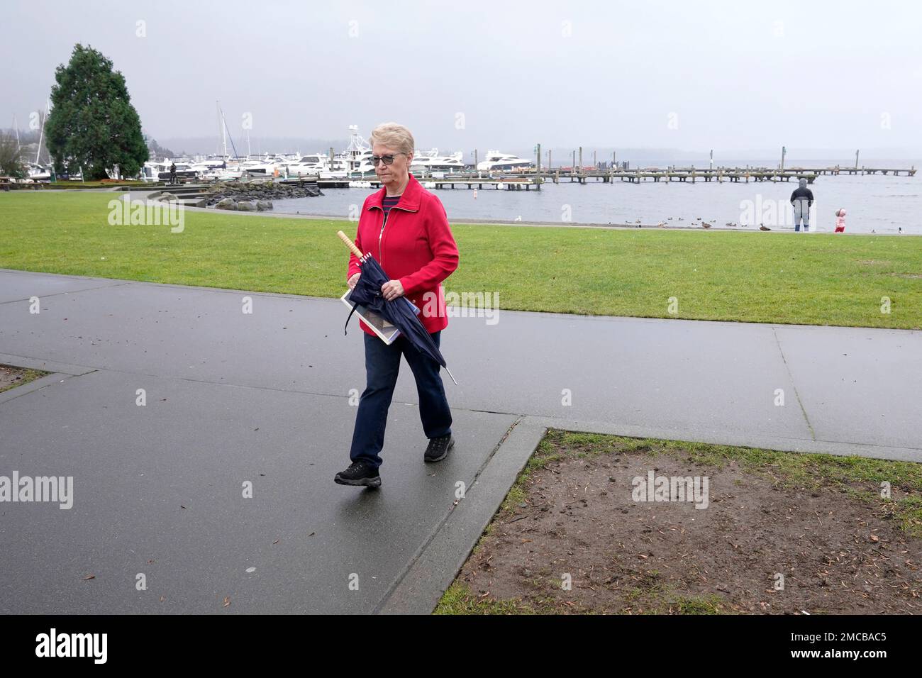 Diane Ostrander walks near the Lake Washington waterfront, Thursday ...