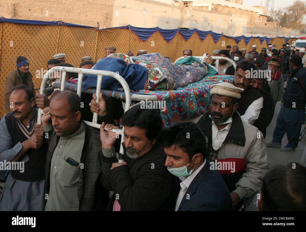 Pakistanis carry the body of Christian priest Father William Siraj, 75 ...