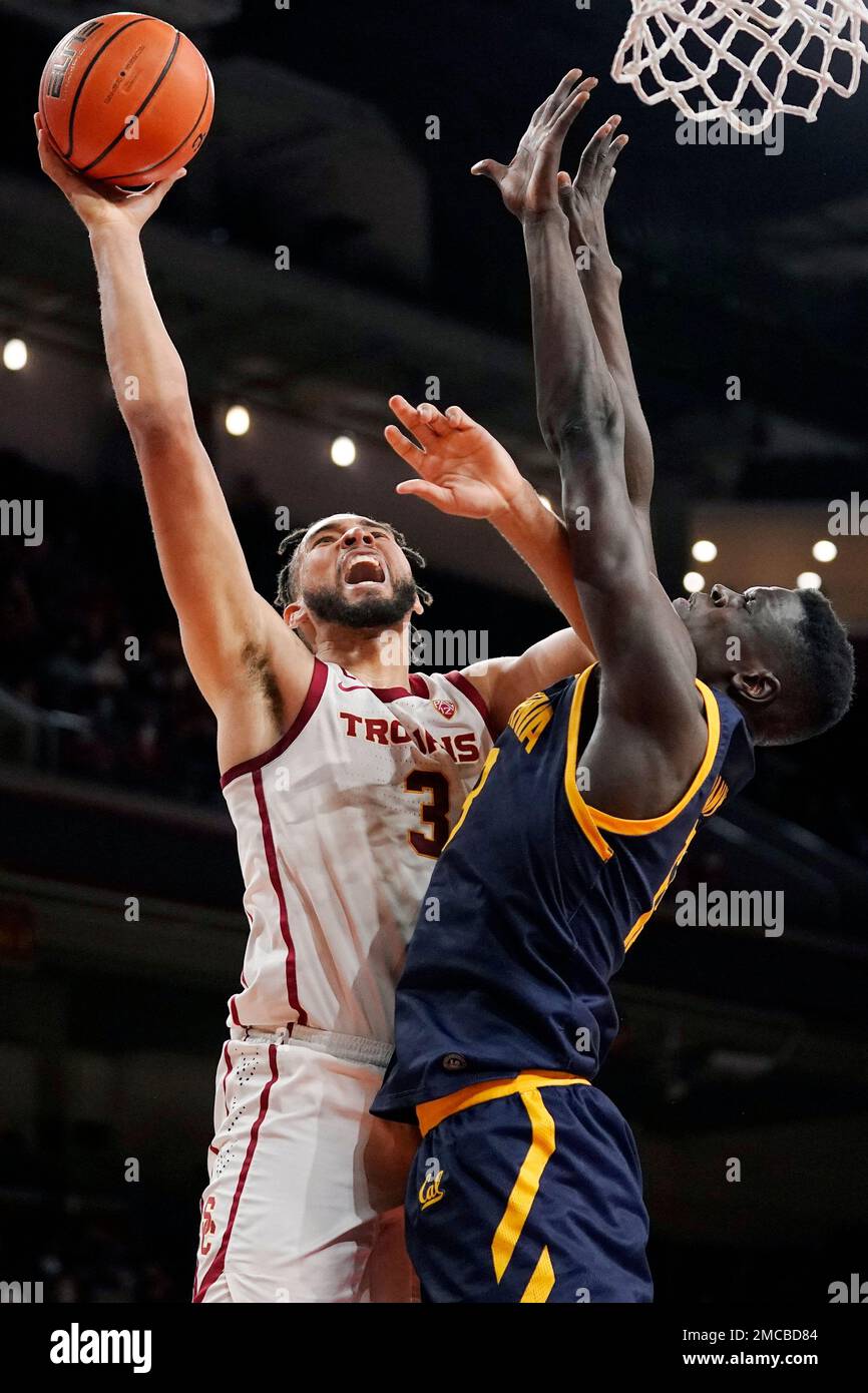 Southern California forward Isaiah Mobley, left, shoots as California ...