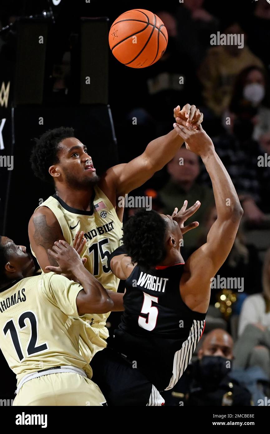 Vanderbilt forward Terren Frank (15) blocks a shot by Georgia guard ...