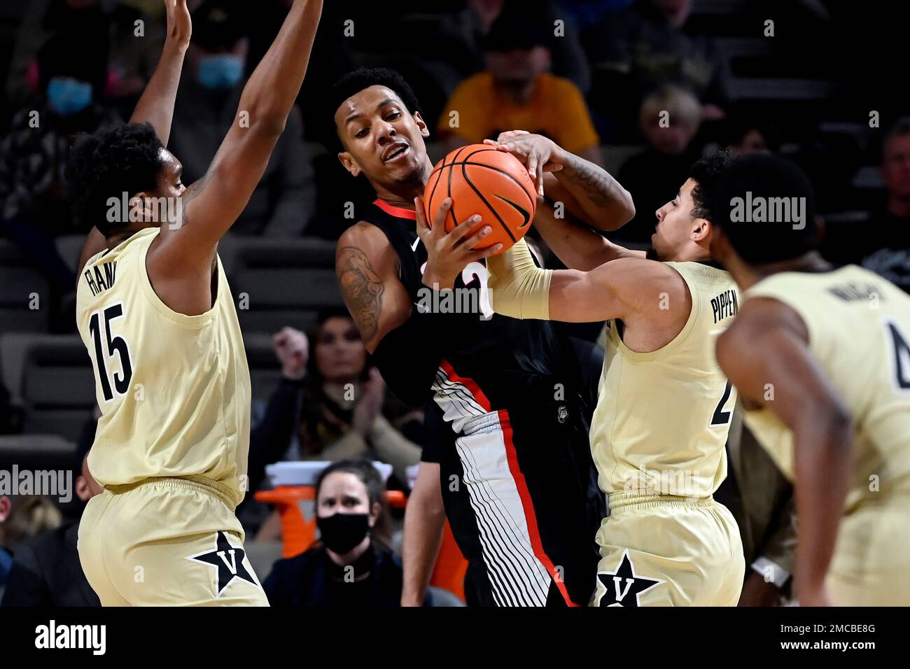 Georgia guard Braelen Bridges, center, grabs a rebound between ...
