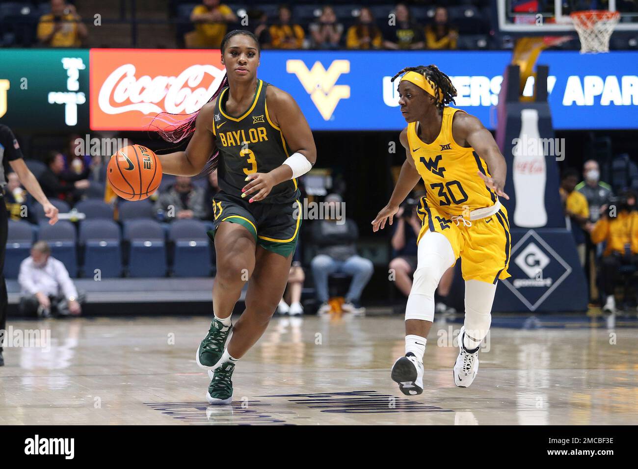 Baylor guard Jordan Lewis (3) is defended by West Virginia guard ...