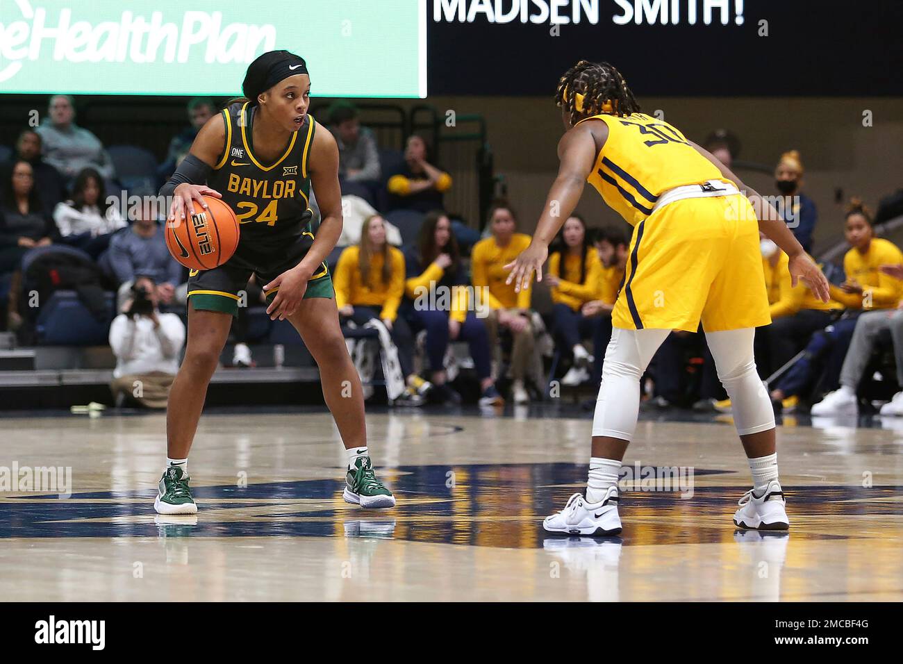 Baylor guard Sarah Andrews (24) is defended by West Virginia guard ...