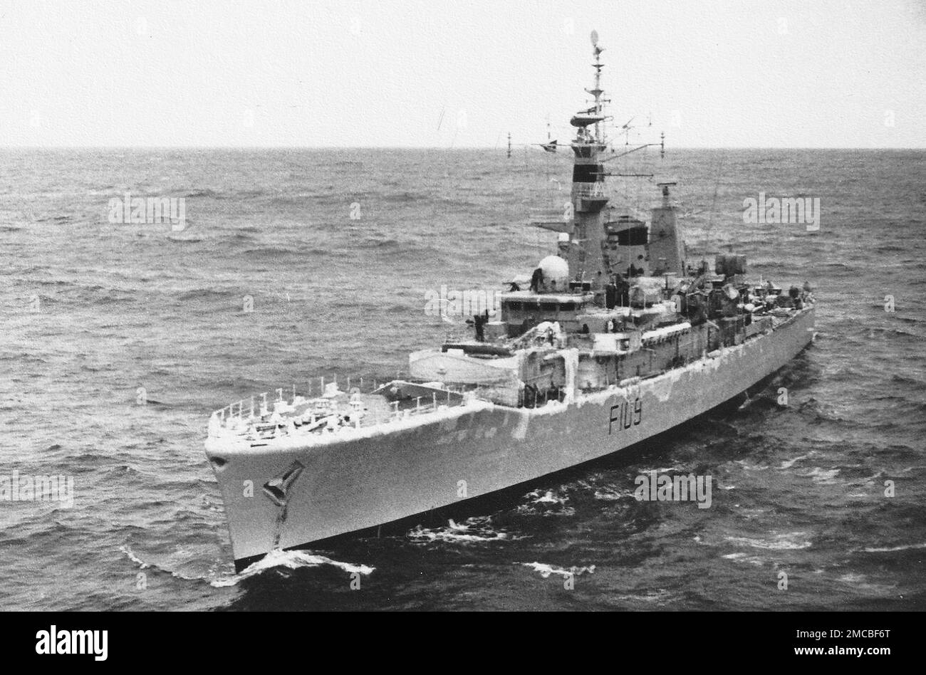 HMS LEANDER COVERED IN ICE OFF THE COAST OF ICELAND DURING THE COD WAR ...